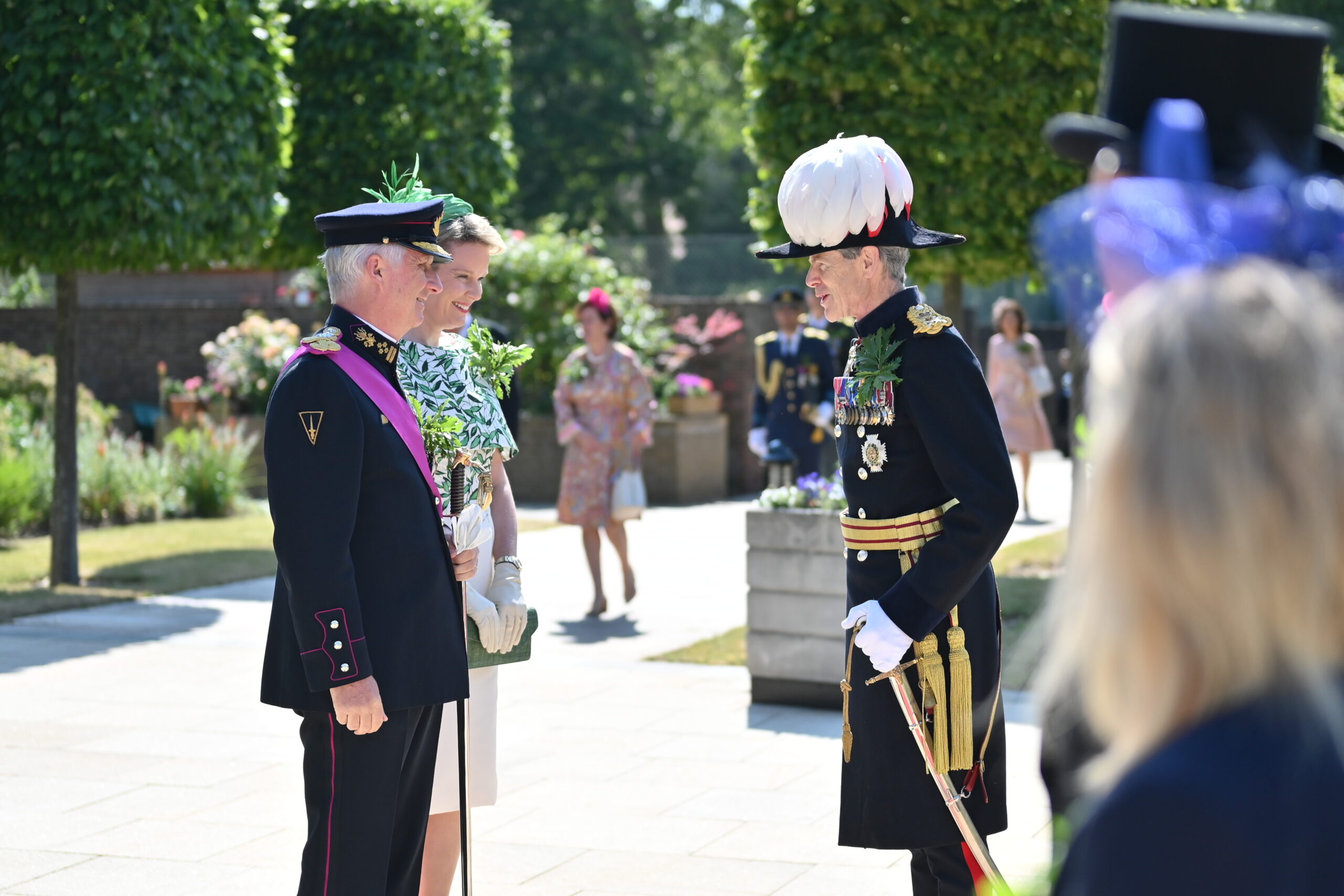 Belgium's Queen Mathilde honours a very English tradition on a sunny ...